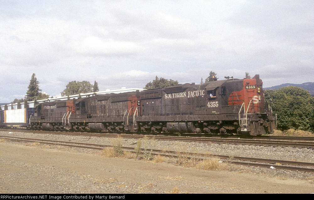 Three Cadillacs Working